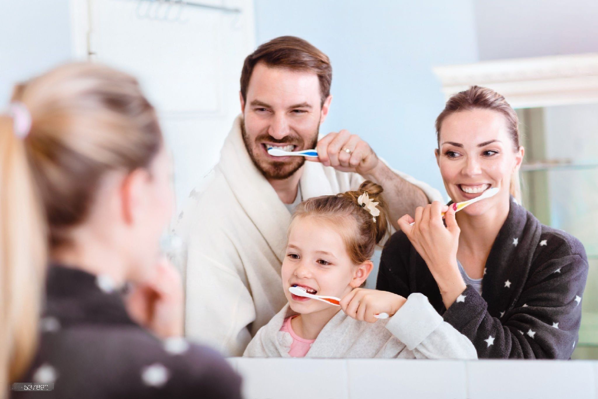Family Brushing Teeth